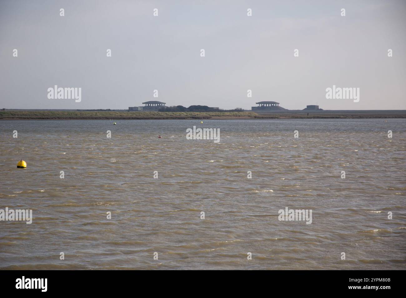 River Ore near Orford, Suffolk, with the nuclear testing pagodas of ...
