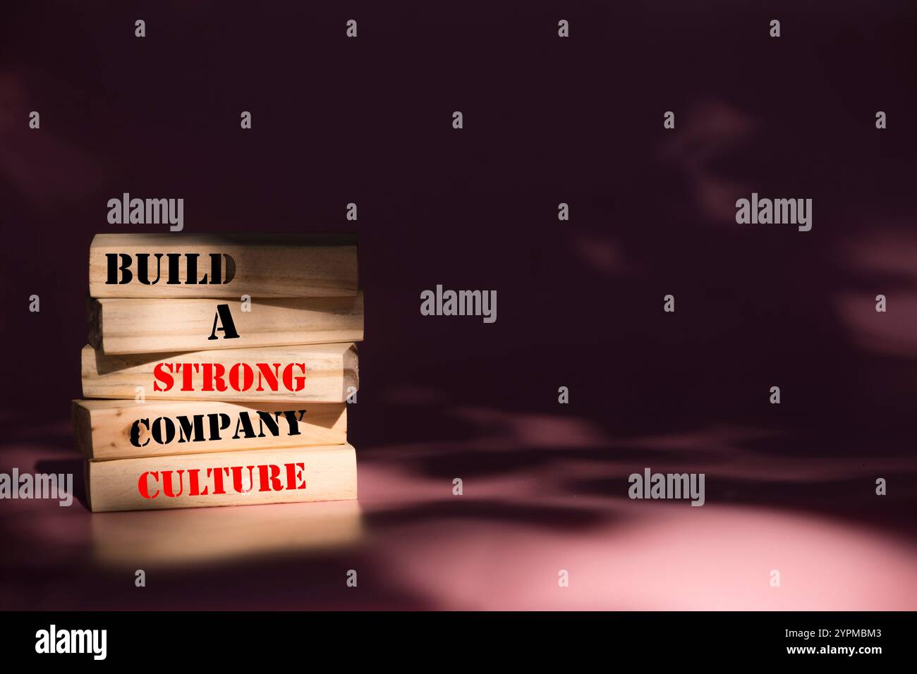 Company culture symbol. Wooden blocks with words Build a strong company ...