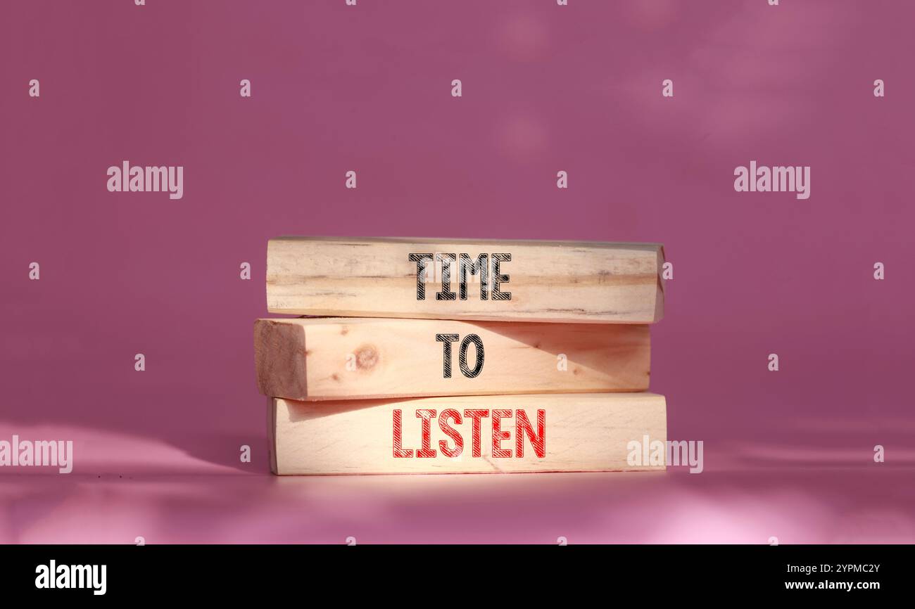 Time to listen symbol. Concept word Time to Listen on wooden blocks ...