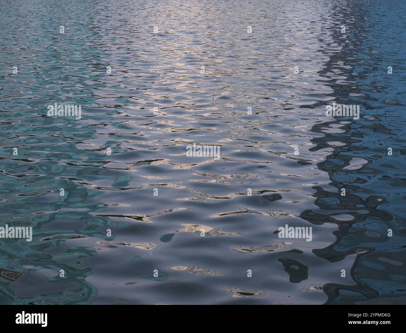 Calm Lake Water Surface with Gentle Ripples and Reflections Stock Photo ...