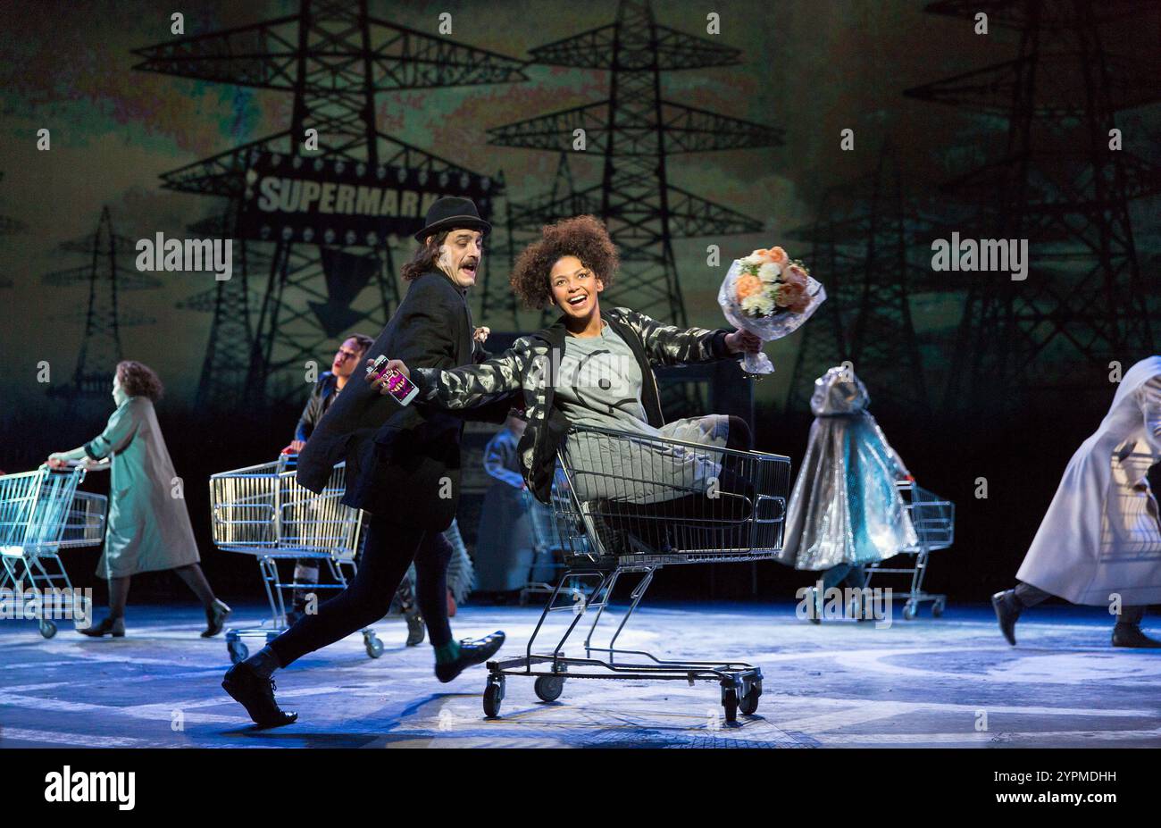 Paul Hilton (Matt), Lois Chimimba (Aly) in wonder.land at the Olivier Theatre, National Theatre ...