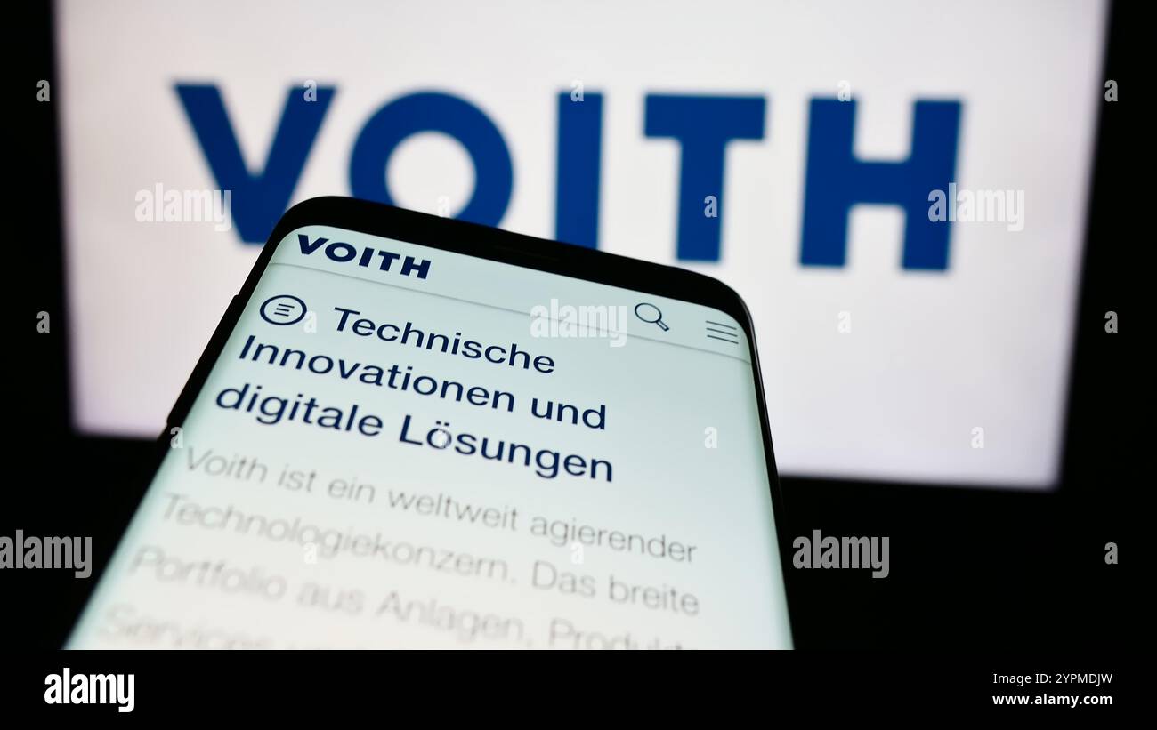 In this photo illustration, a smartphone with the website of German ...