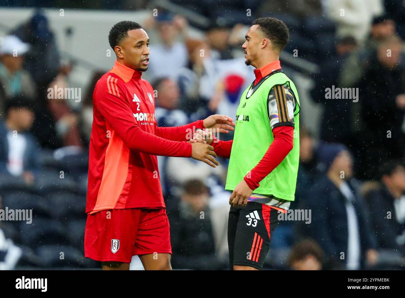 Kenny Tete and Antonee Robinson warm up prior to the Premier League ...