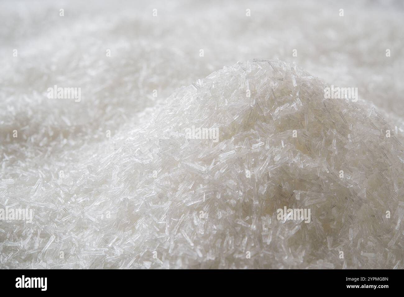 Heap of monosodium glutamate white crystals background. Pile of food ...
