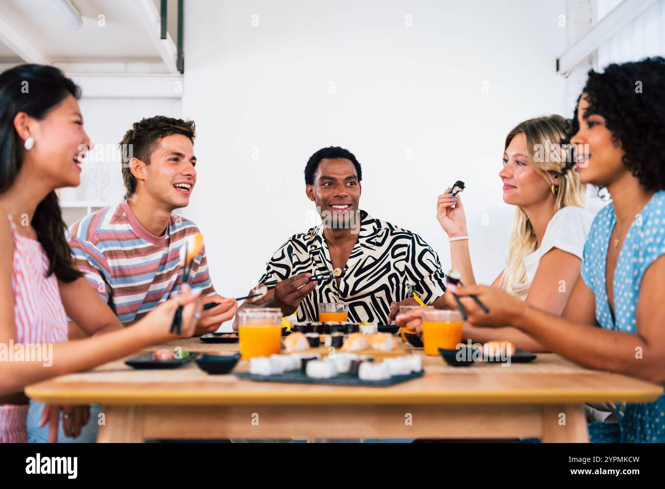 Multiethnic group young people lunch hi-res stock photography and ...