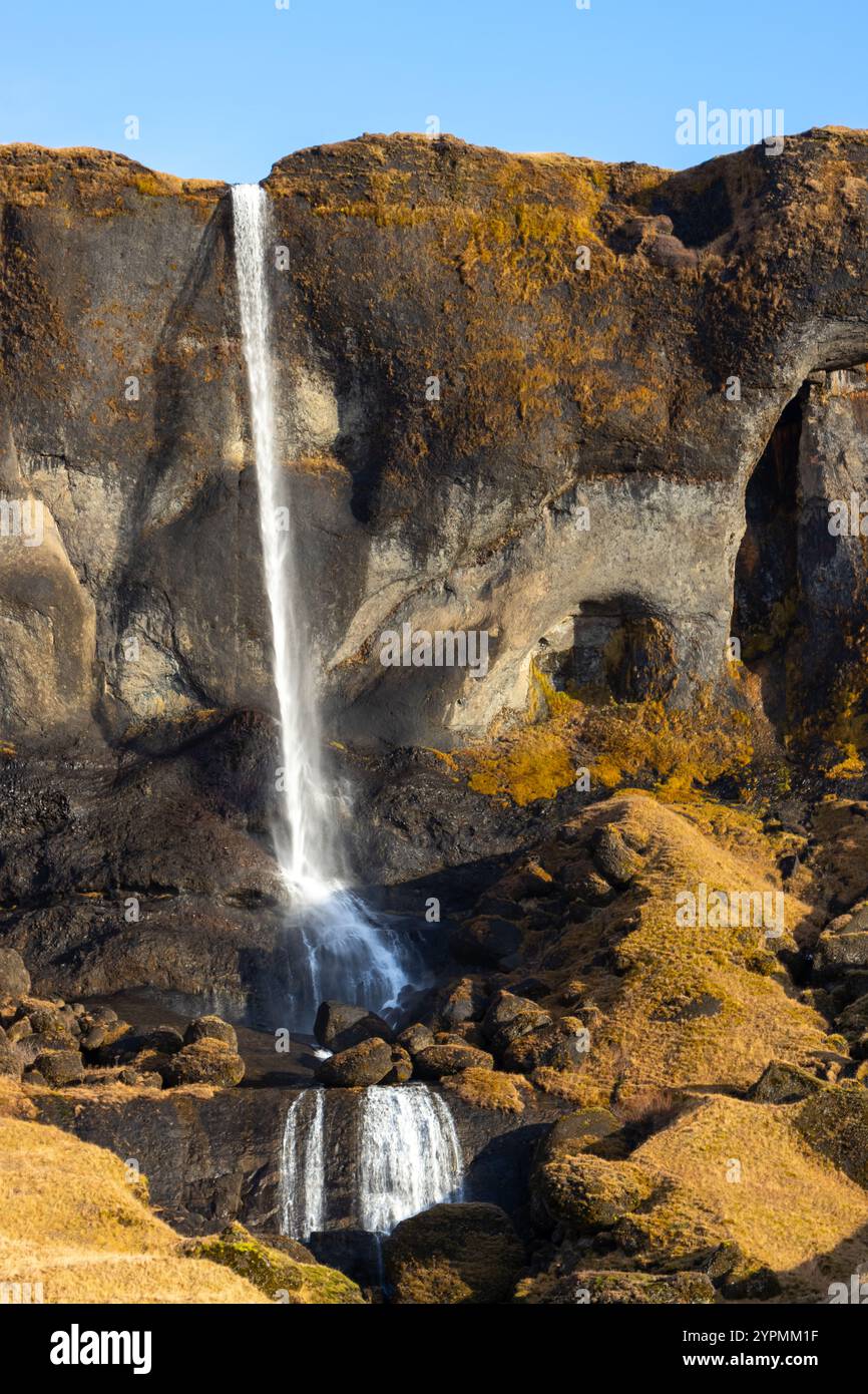 Mountain covered by moss and lichen. Volcanic rock with a structured ...