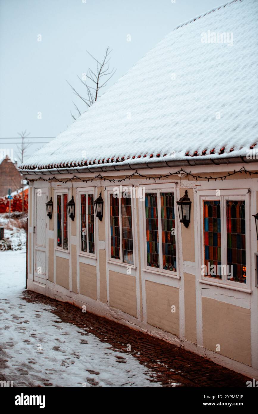 Snowy rooftops of traditional Danish buildings near Hans Christian ...