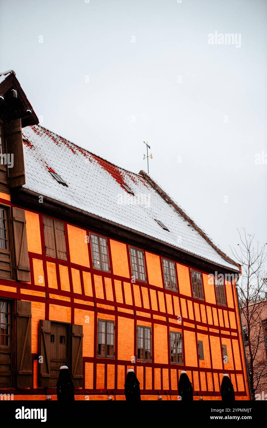 Snowy rooftops of traditional Danish buildings near Hans Christian ...