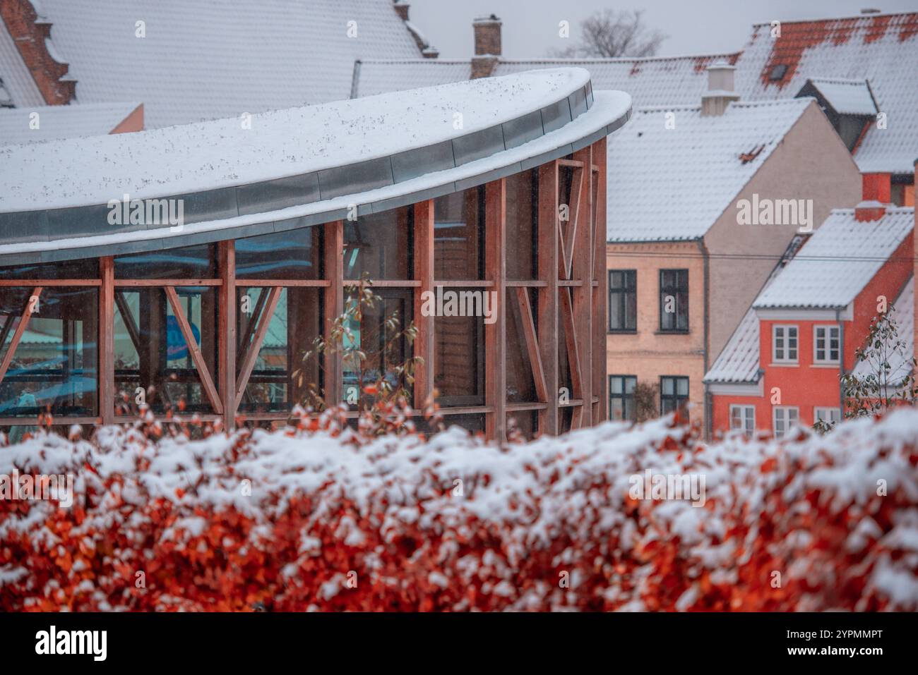 Snowy rooftops of traditional Danish buildings near Hans Christian ...