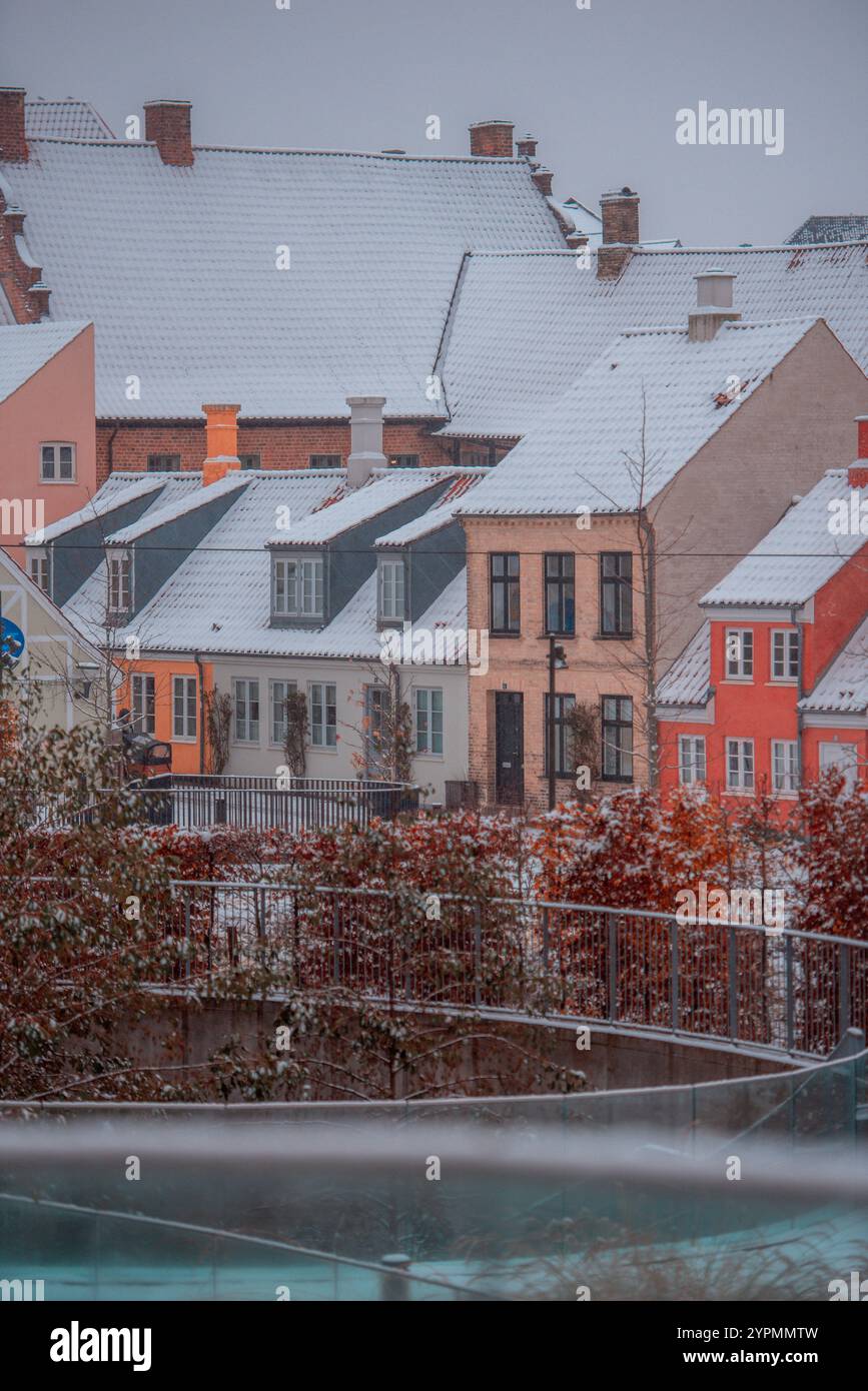 Snowy rooftops of traditional Danish buildings near Hans Christian ...