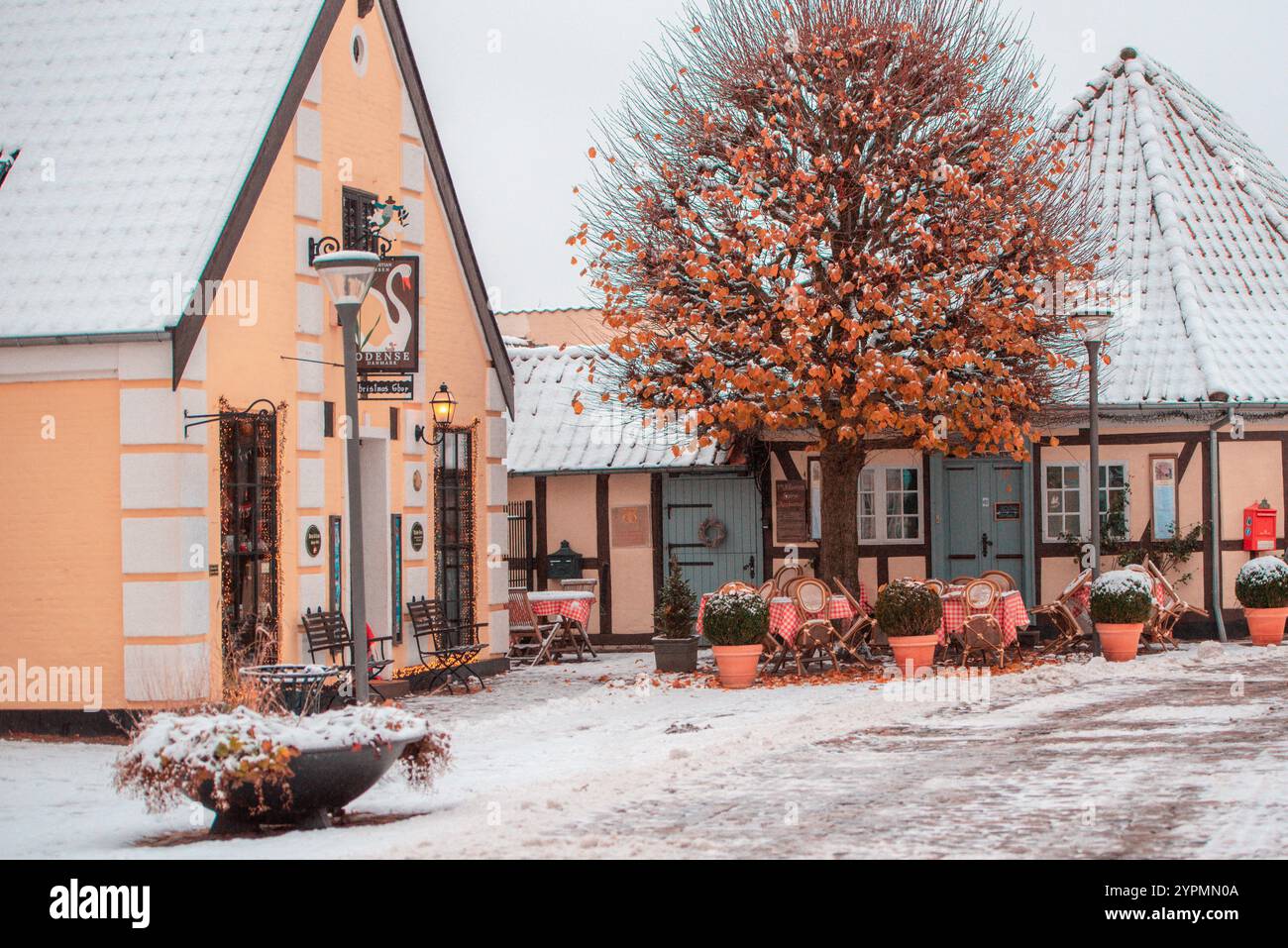 Snow-covered Scandinavian streets in Odense, Denmark, featuring ...