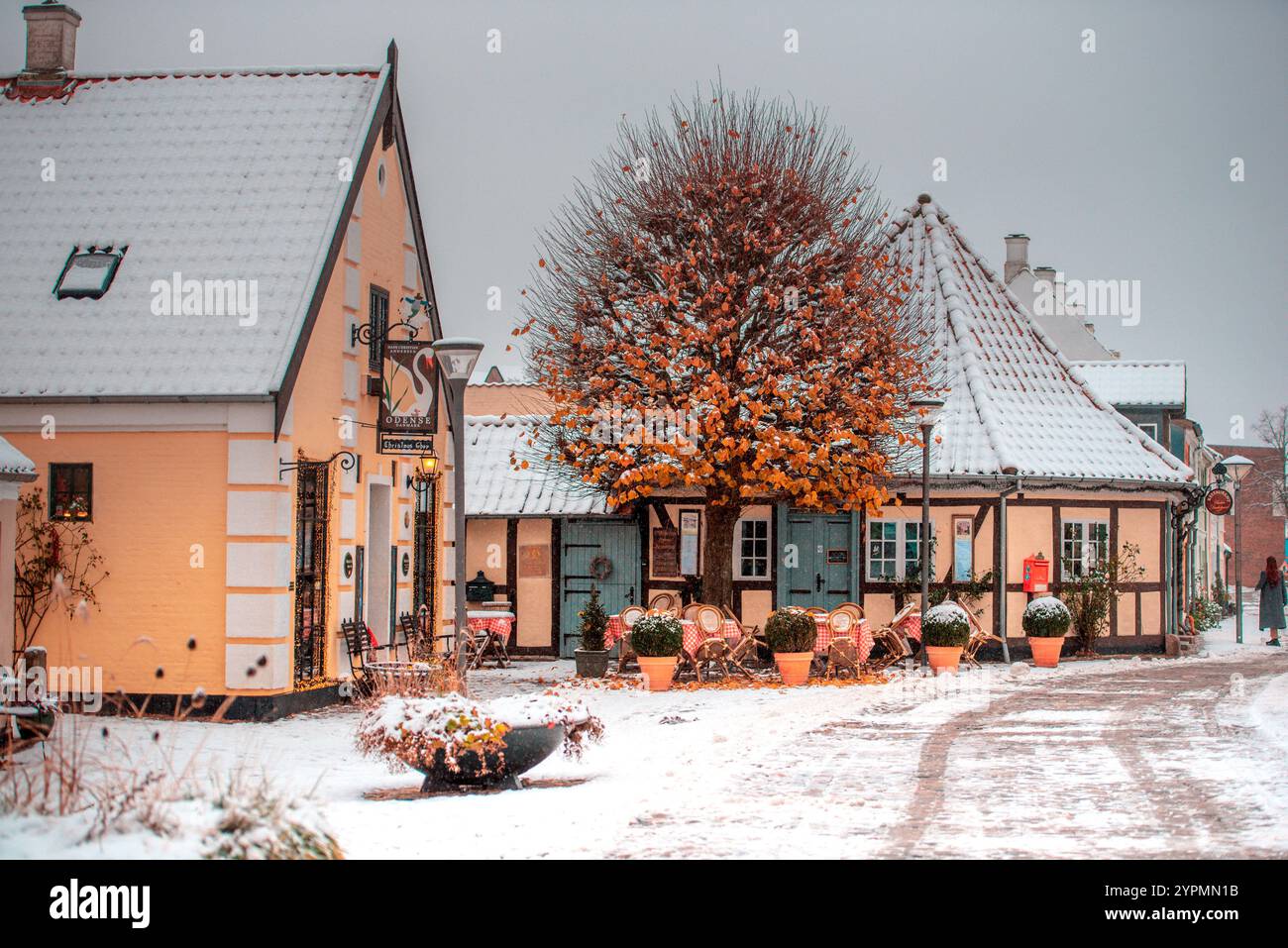 Snow-covered Scandinavian streets in Odense, Denmark, featuring ...