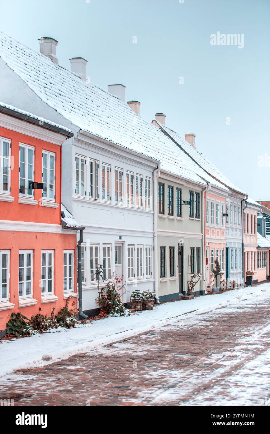 Snow-covered Scandinavian streets in Odense, Denmark, featuring ...