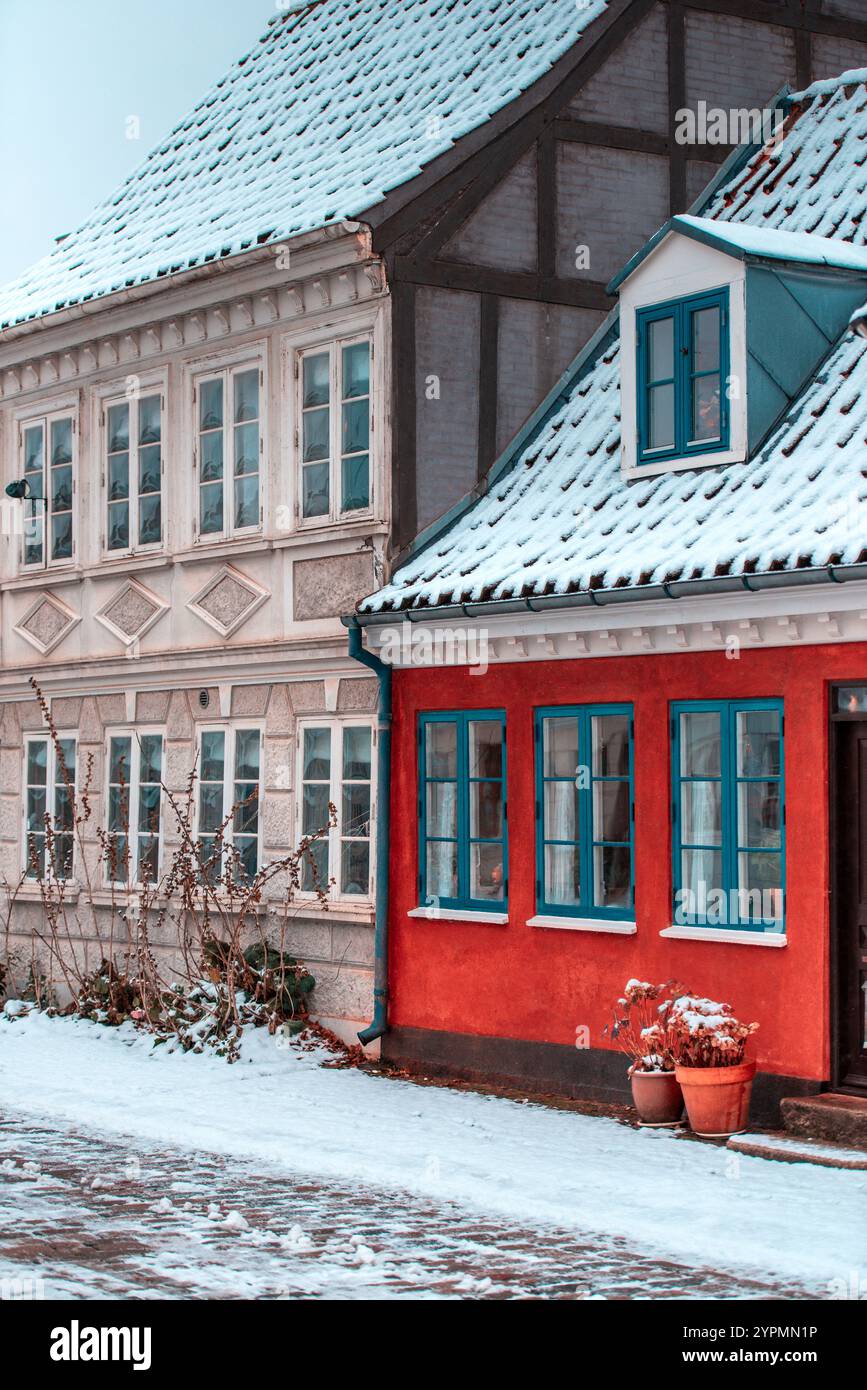 Snow-covered Scandinavian streets in Odense, Denmark, featuring ...