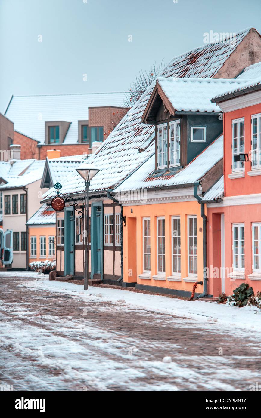 Snow-covered Scandinavian streets in Odense, Denmark, featuring ...
