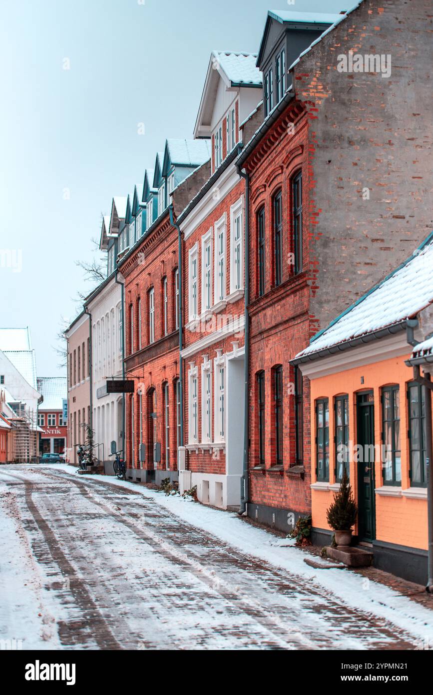 Snow-covered Scandinavian streets in Odense, Denmark, featuring ...