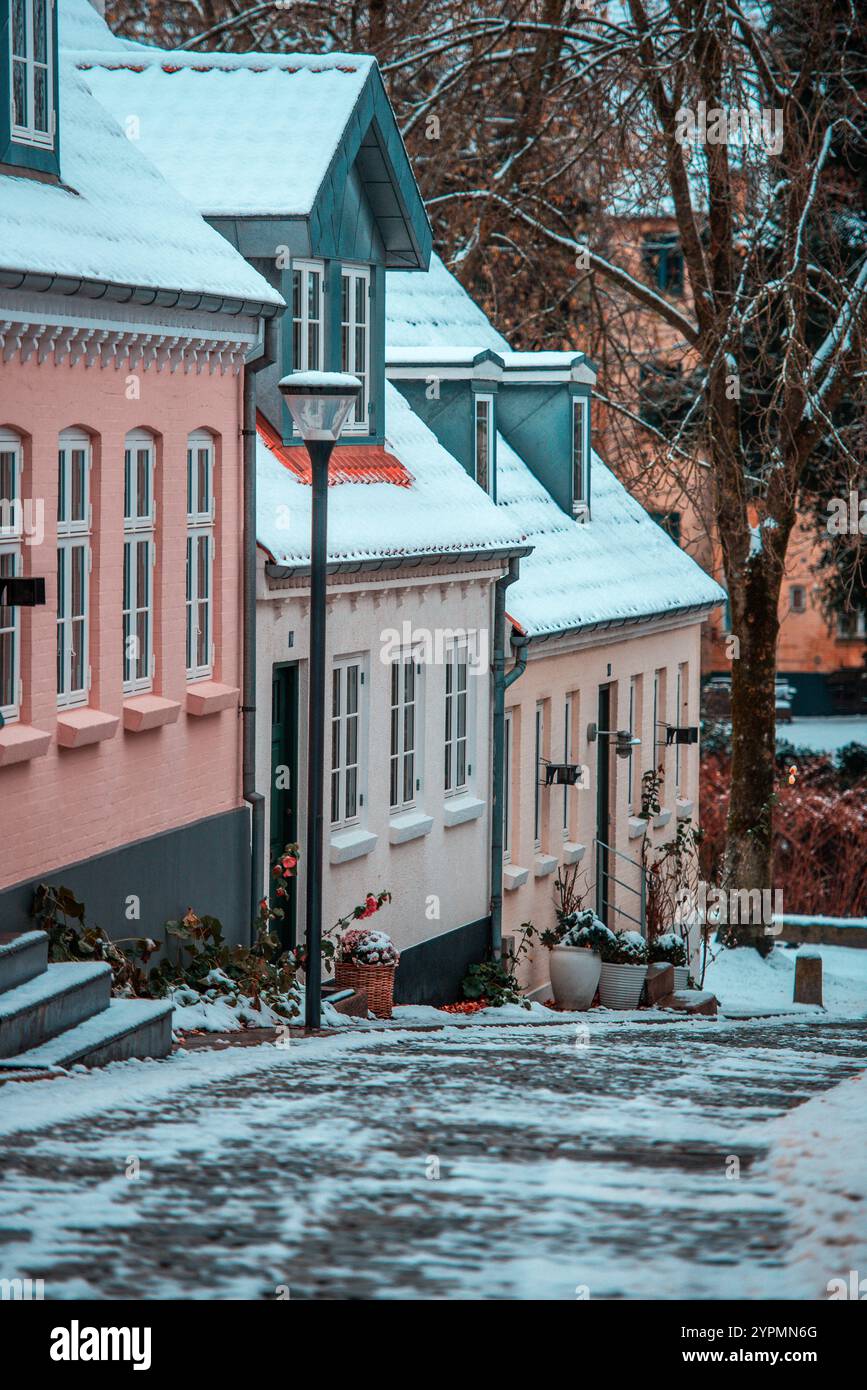 Snow-covered Scandinavian streets in Odense, Denmark, featuring ...