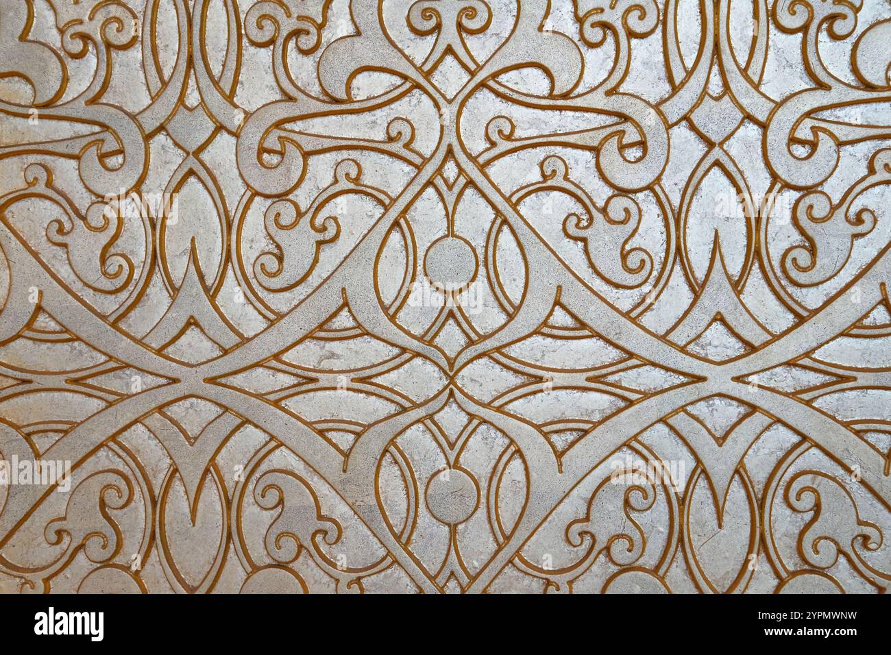 Traditional vintage arabic ethnic arabesque pattern on gray gold metal ...