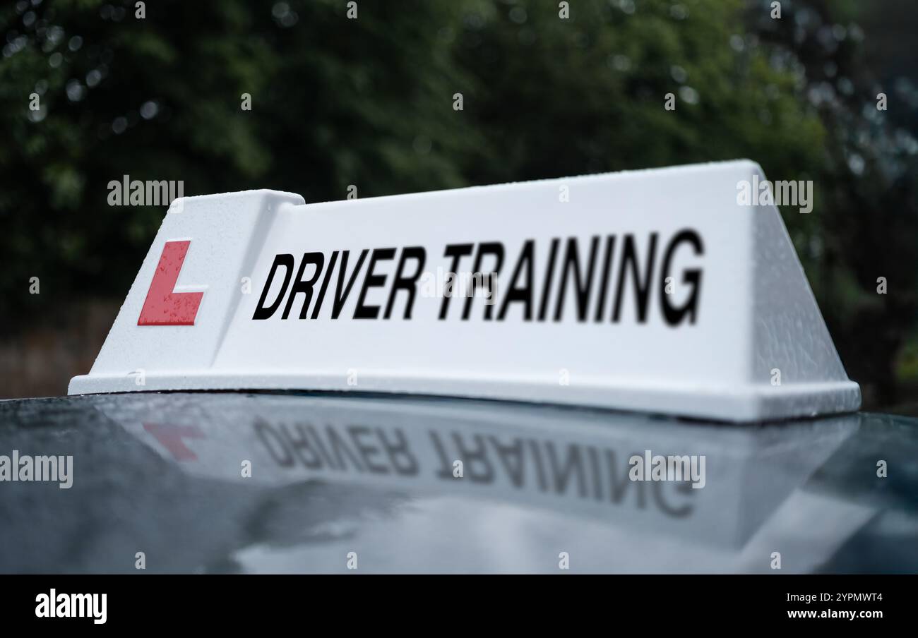 A Driver Training Sign On The Top Of A Car In The UK Stock Photo - Alamy