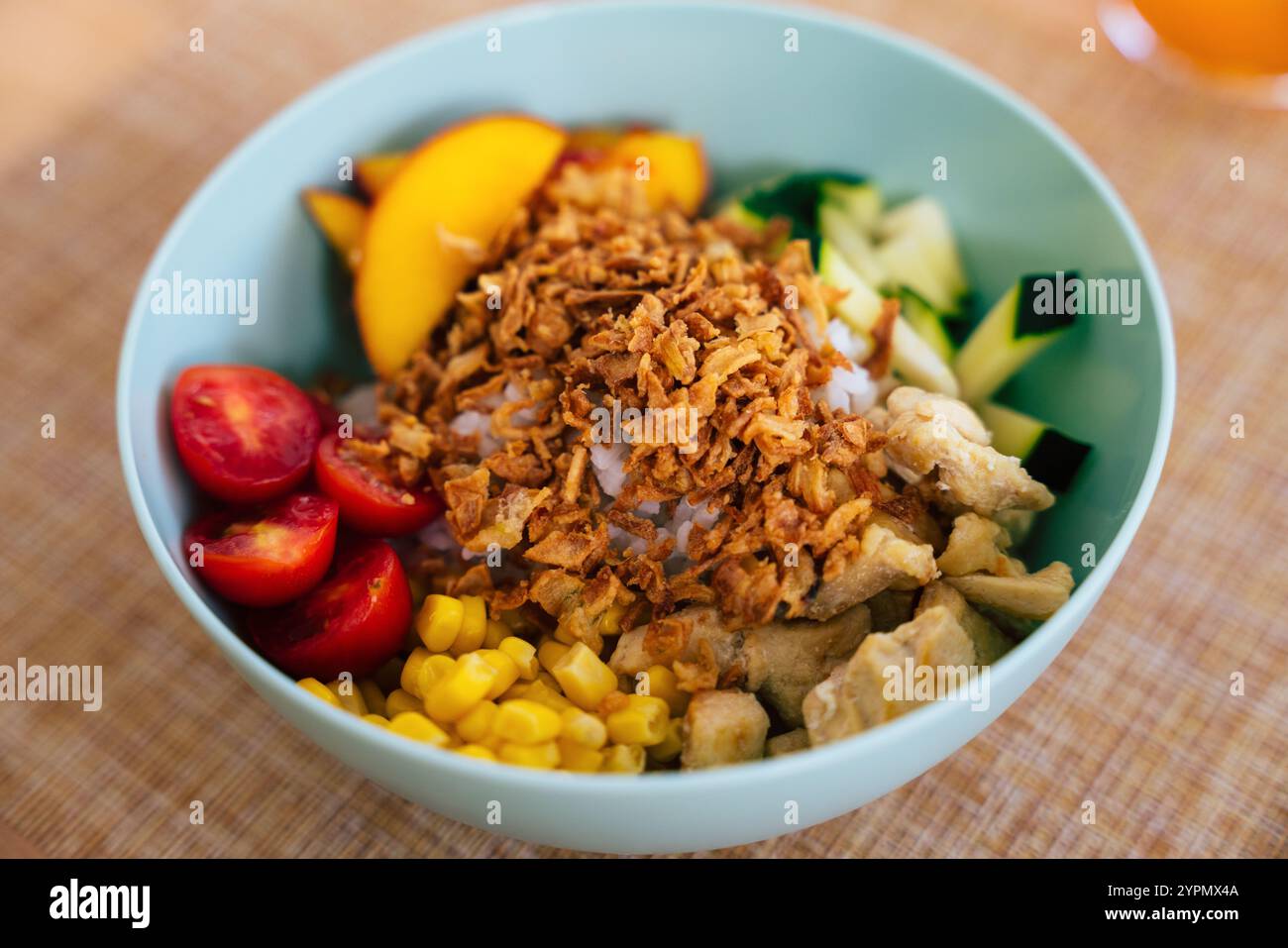 Hawaiian poke bowl with chicken, fruit and vegetables Stock Photo - Alamy