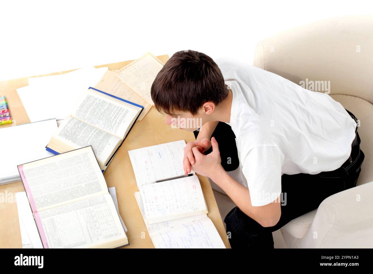A teenager studying hard for the exam Stock Photo - Alamy