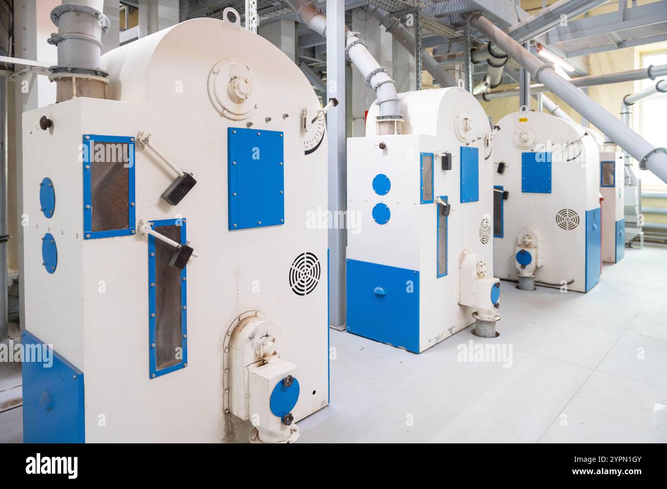 Roller deck machines for husking buckwheat grain, operating in a modern ...