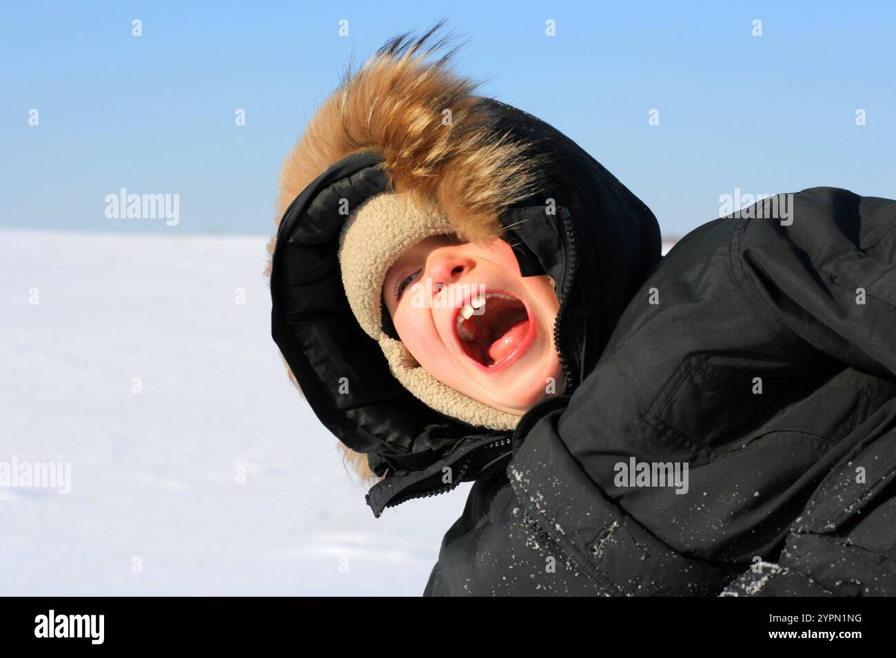 portrait of screaming boy in the winter Stock Photo - Alamy