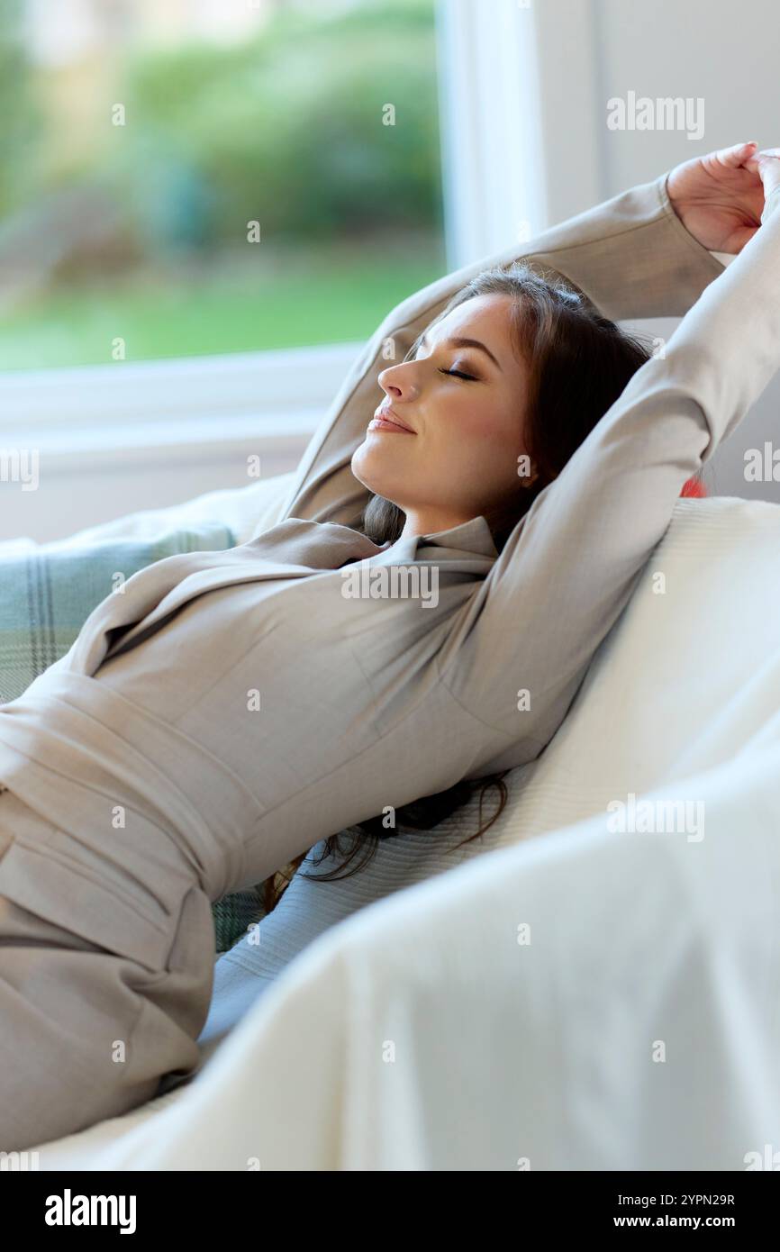 Beautiful woman relaxing Stock Photo - Alamy