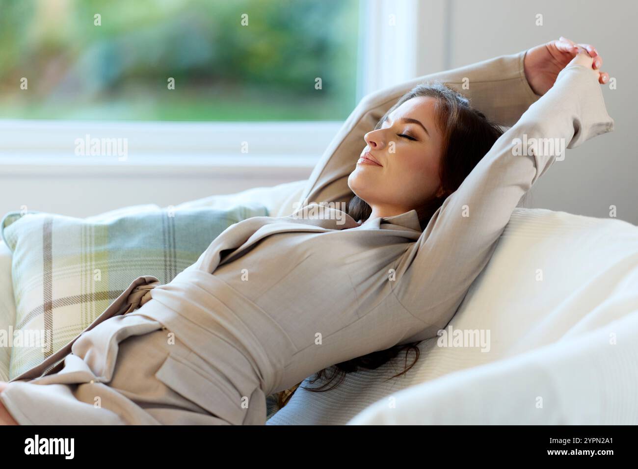 Beautiful woman relaxing Stock Photo - Alamy