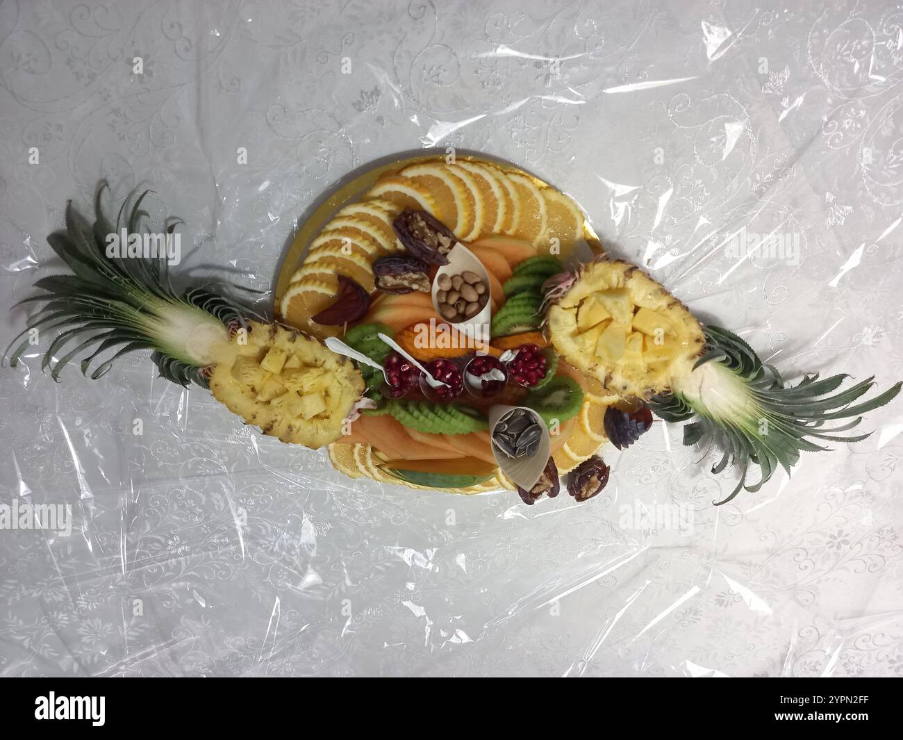 Fruit platter in the form of a pineapple and other fruits Stock Photo ...