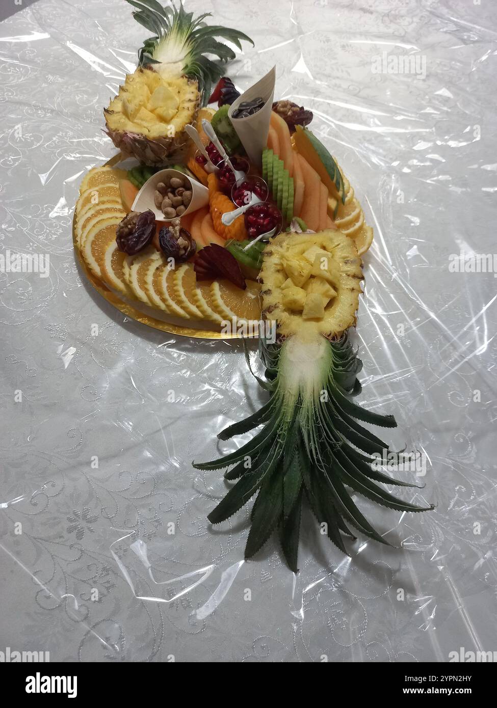 Fruit platter in the form of a pineapple and other fruits Stock Photo ...