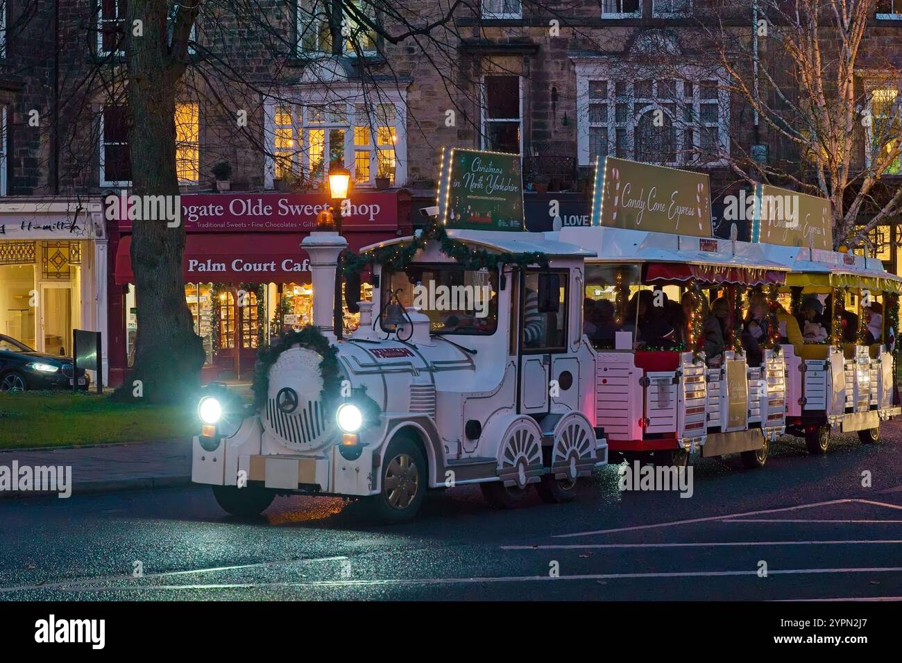 The Candy Cane Express road train takes market-goers on a tour of ...