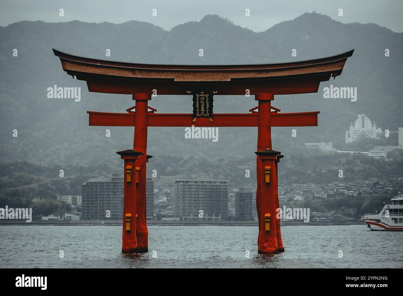 The iconic Itsukushima Torii gate rises from the water in Miyajima ...