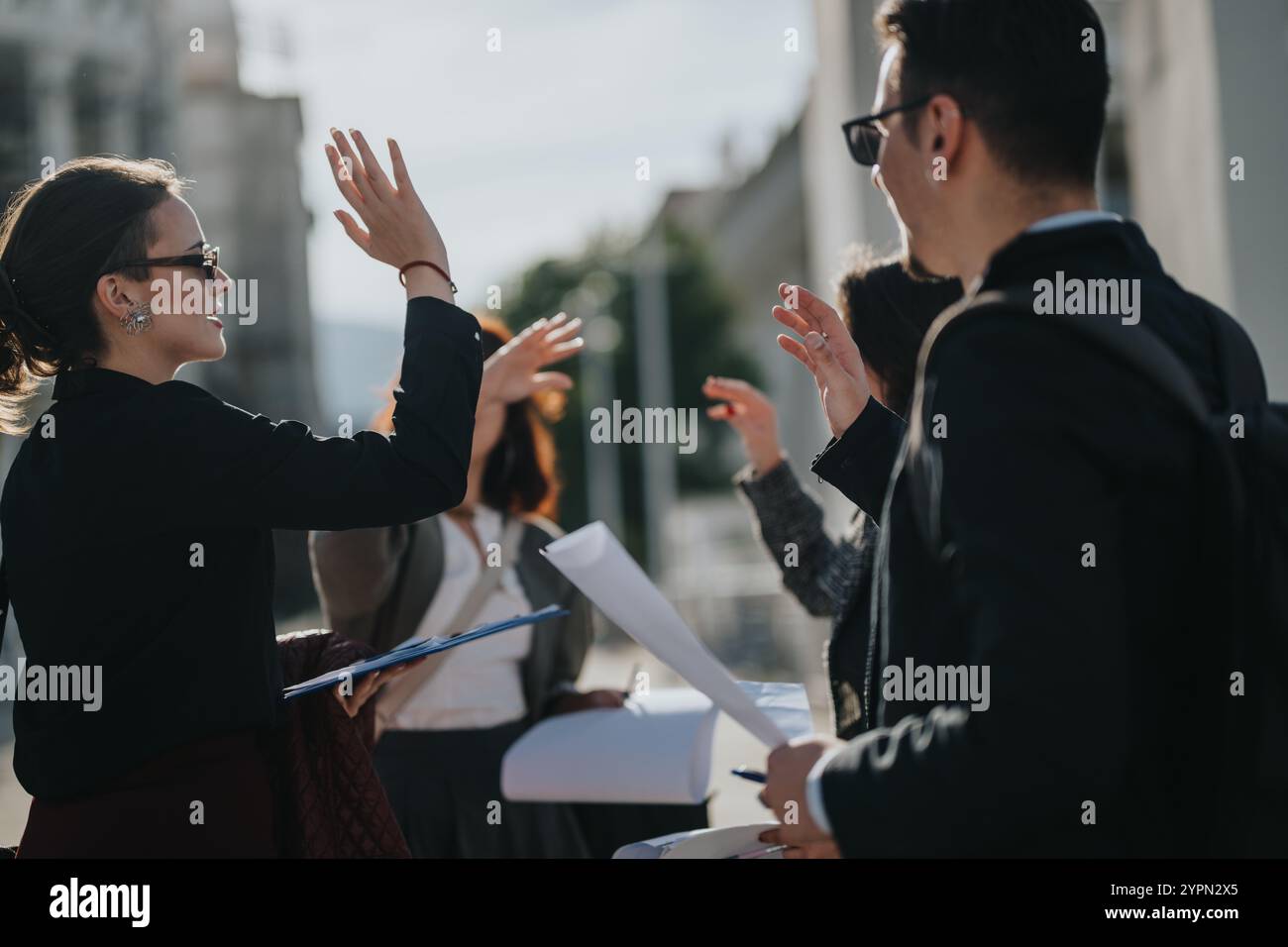 Happy business people high fiving in office hi-res stock photography ...