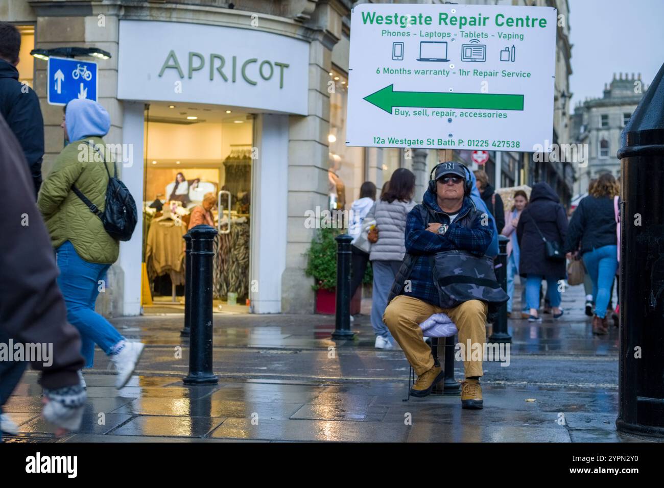 Sandwich board man advertising in Stall Street in Central Bath in the ...