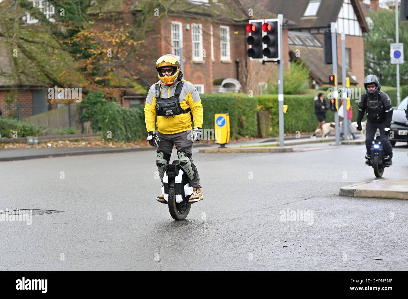 Cambridge, England, 30 November 2024, UK. Adult rides single wheel seg ...