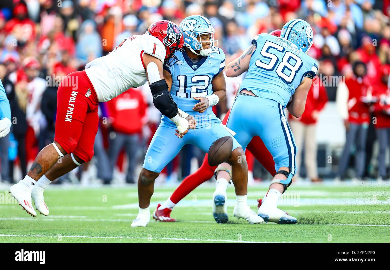 November 30, 2024: North Carolina senior Antavious Lane (1) causes ...