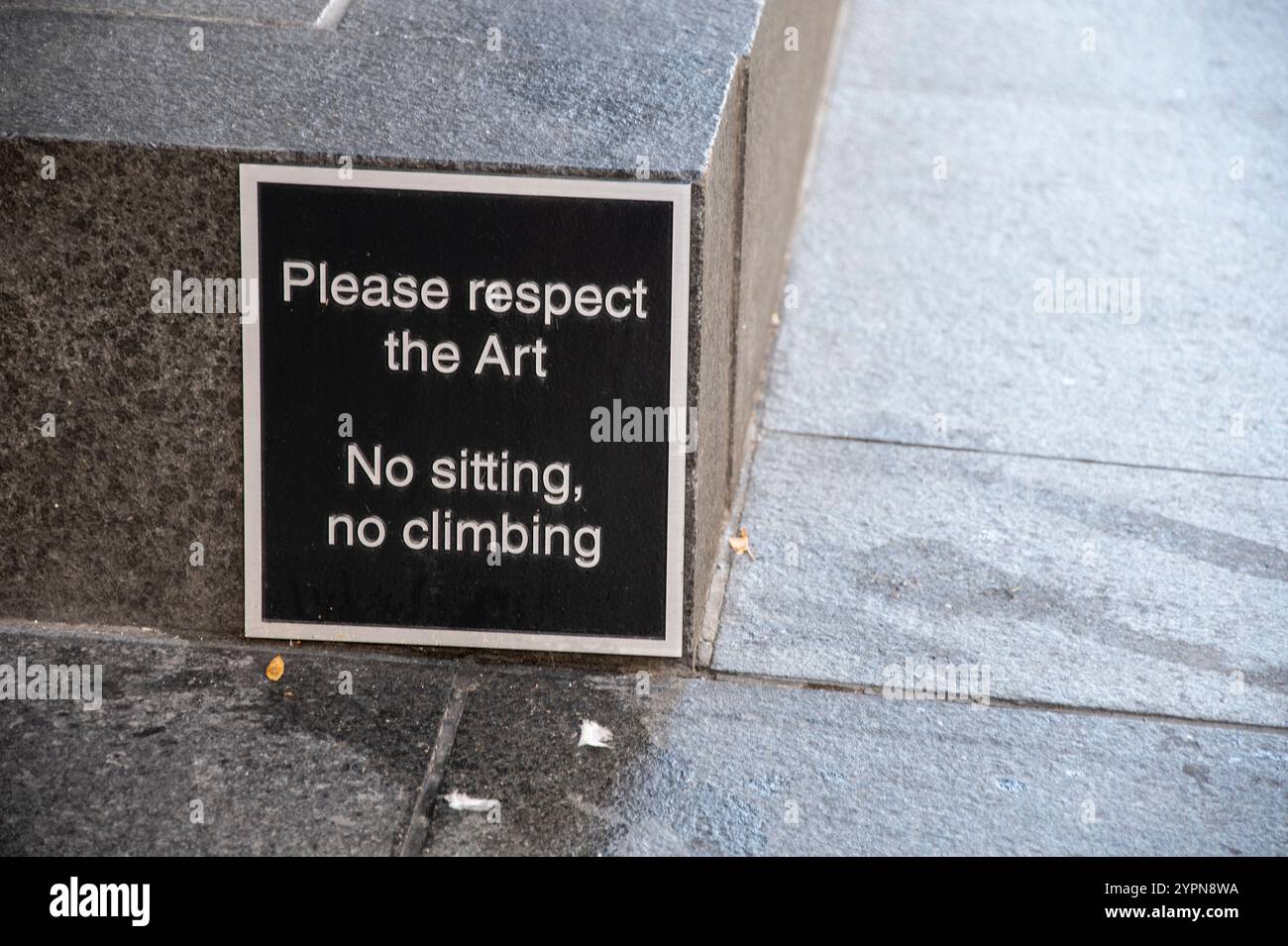 Sign to respect Festival tower blue ribbon sculpture on John Street in ...