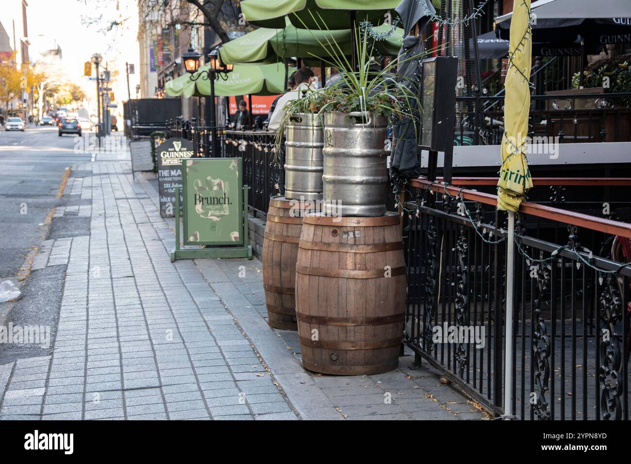 Potted plants in kegs on barrels at the Town Crier Pub on John Street ...