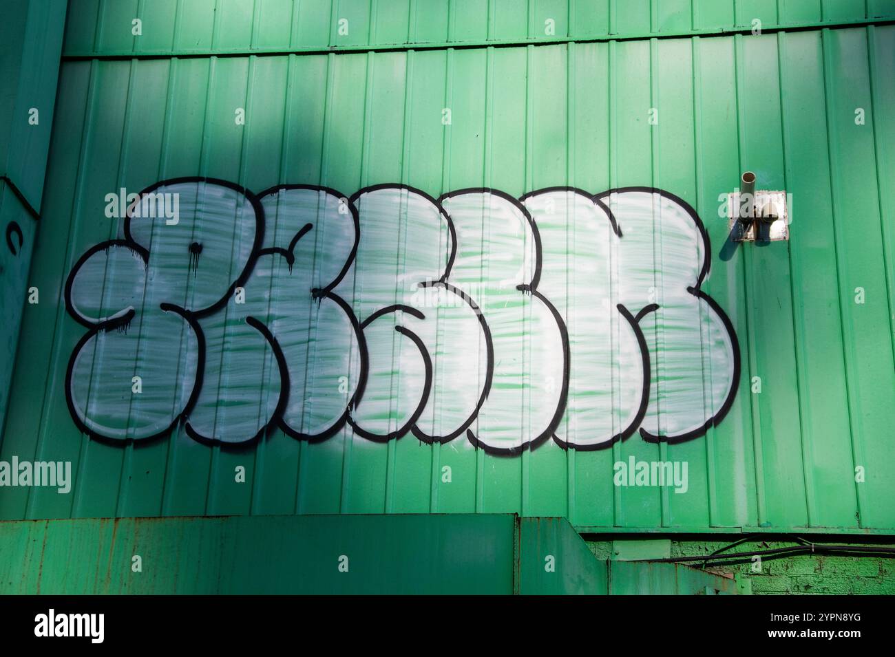Graffiti tagged on a building on Adelaide Street West in downtown ...
