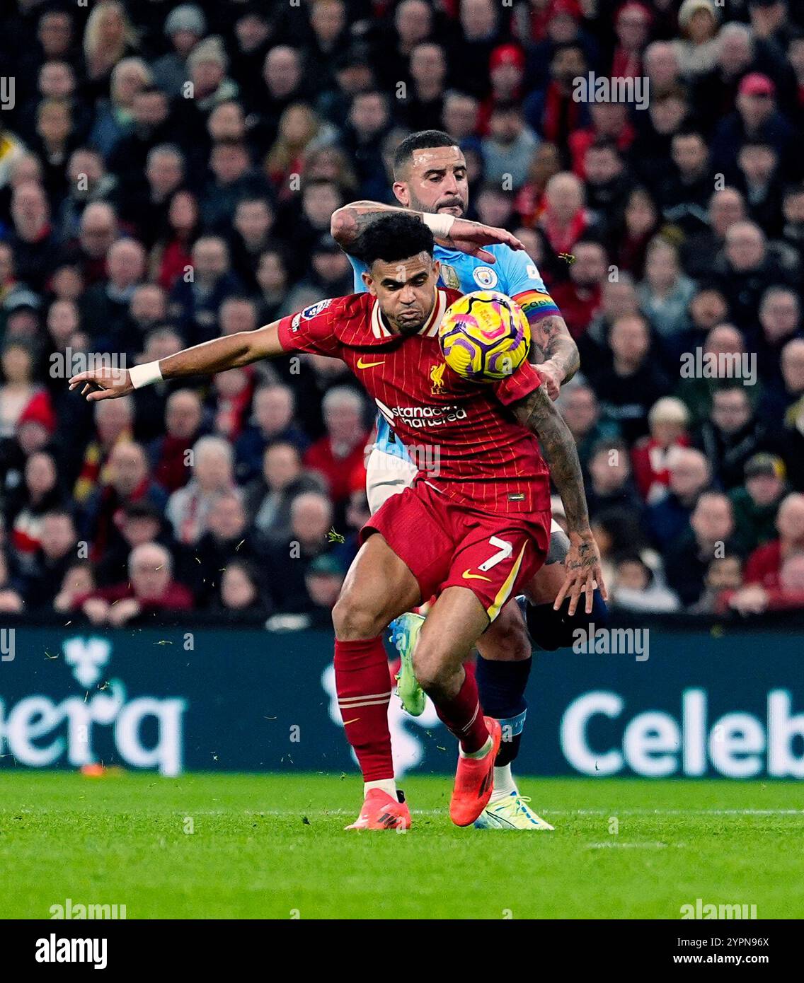 Manchester City's Kyle Walker challenges Liverpool's Luis Diaz during ...