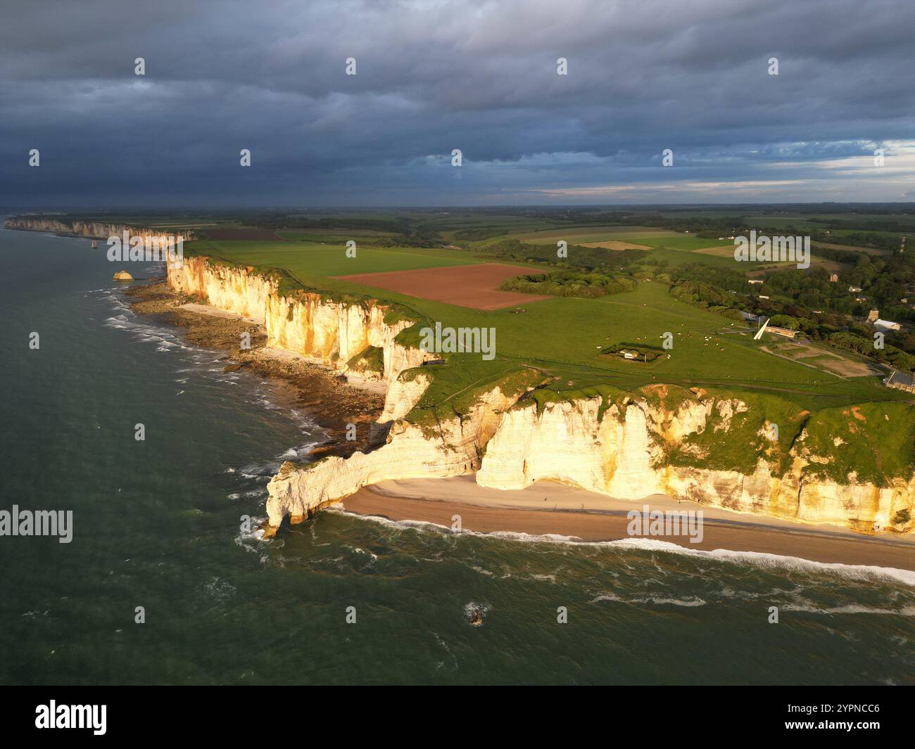 Aerial view of the famous white limestone cliffs near Etretat during ...