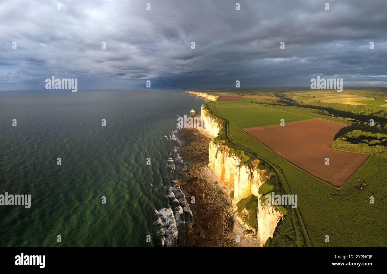 Aerial view of the famous white limestone cliffs near Etretat during ...