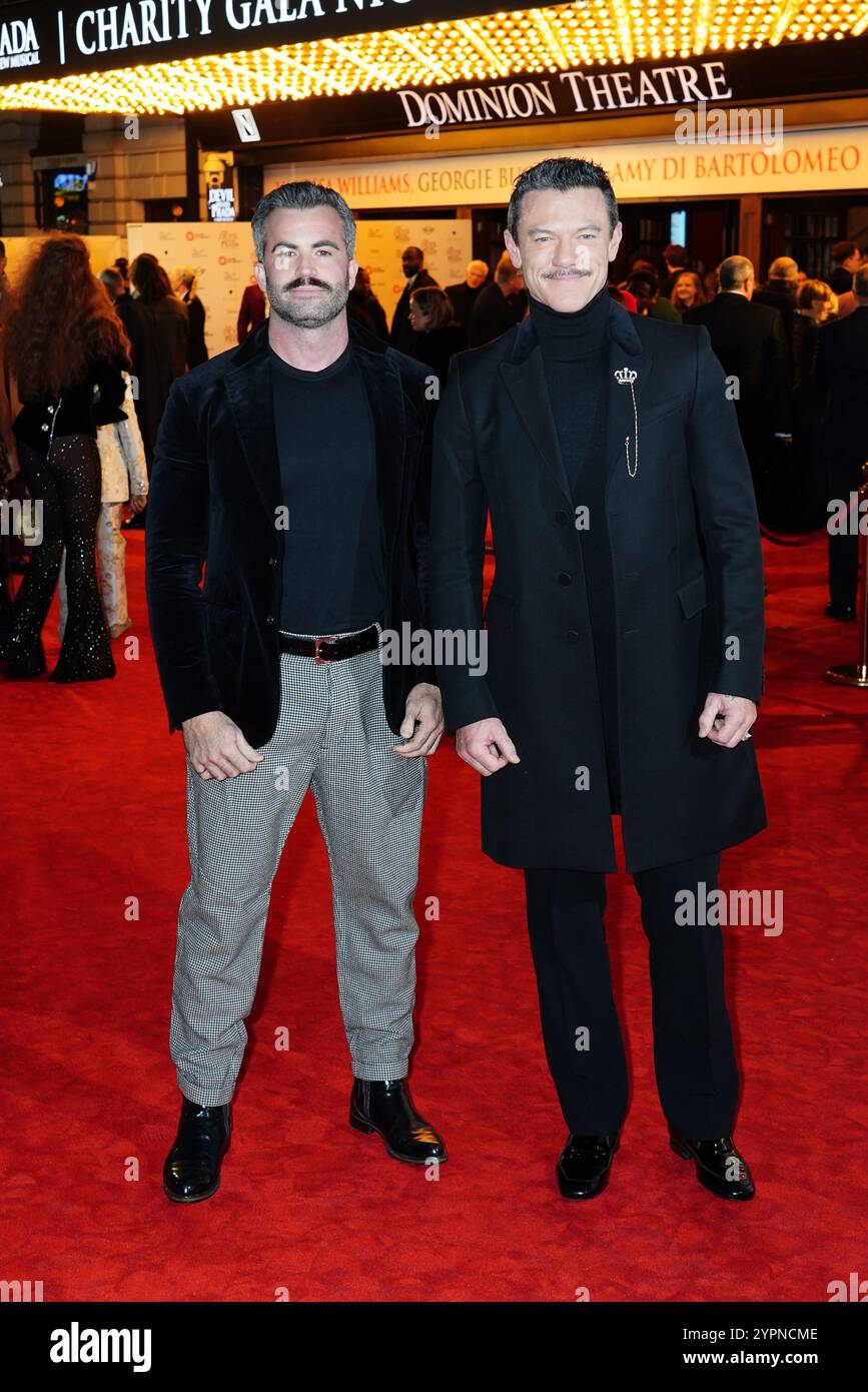 Luke Evans (right) and Fran Tomas attend the opening for the musical ...
