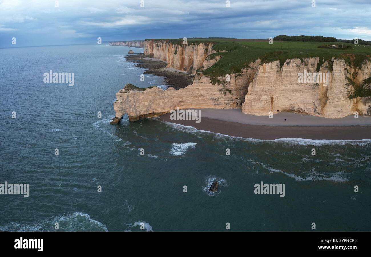 Aerial view of the famous white limestone cliffs near Etretat during ...