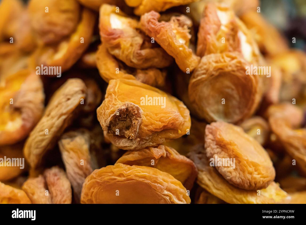 Dried colorful tropical fruits. Sweet fruits in dried form. Close up ...