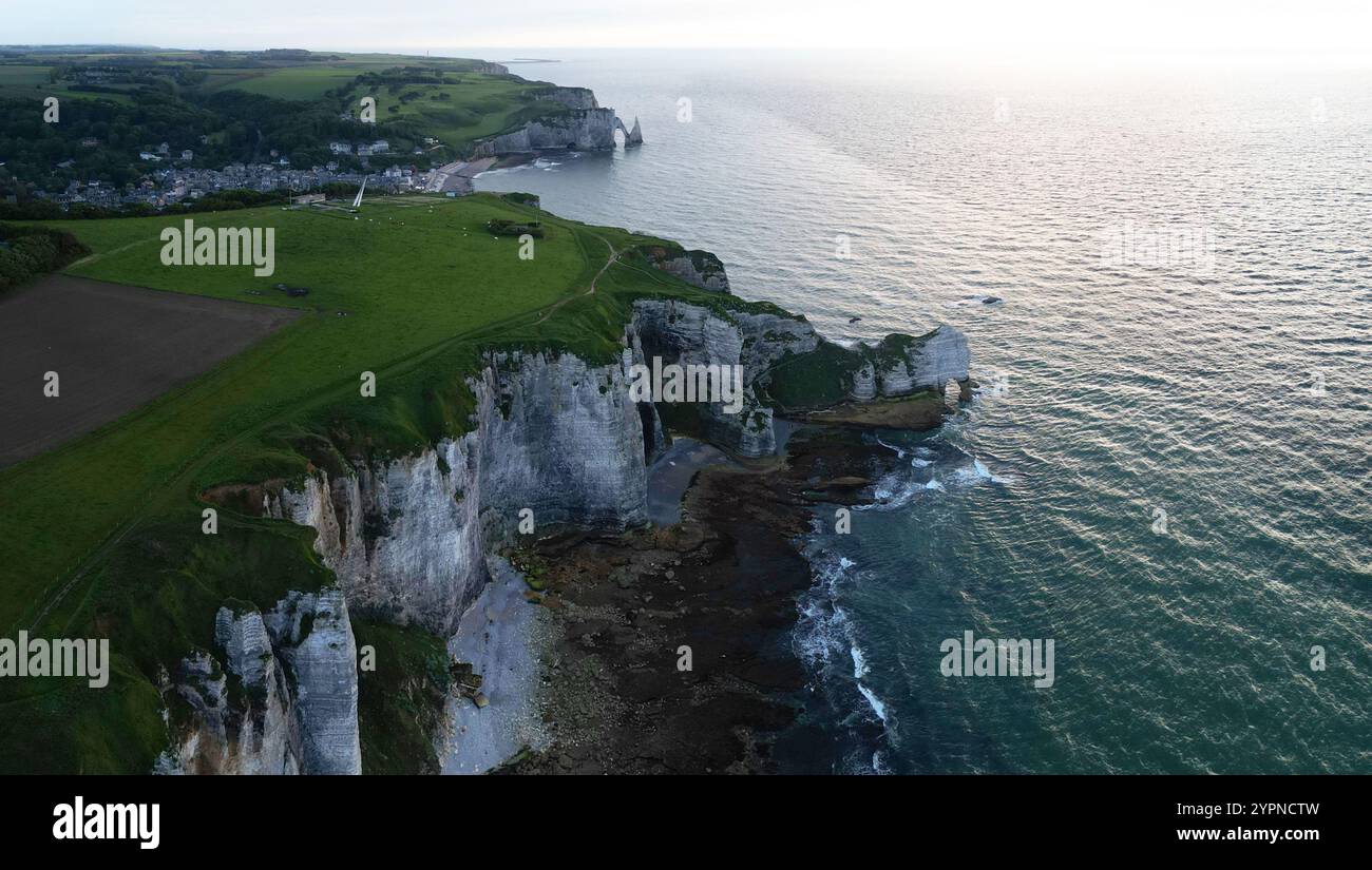Aerial view of the famous white limestone cliffs near Etretat during ...
