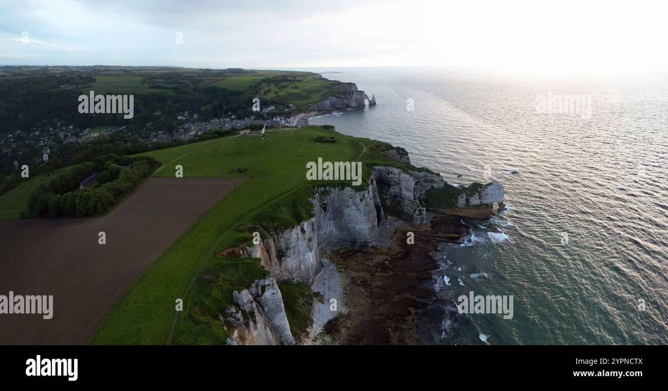 Aerial view of the famous white limestone cliffs near Etretat during ...