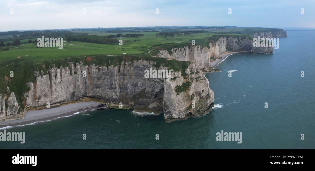 Aerial view of the famous white limestone cliffs near Etretat during ...
