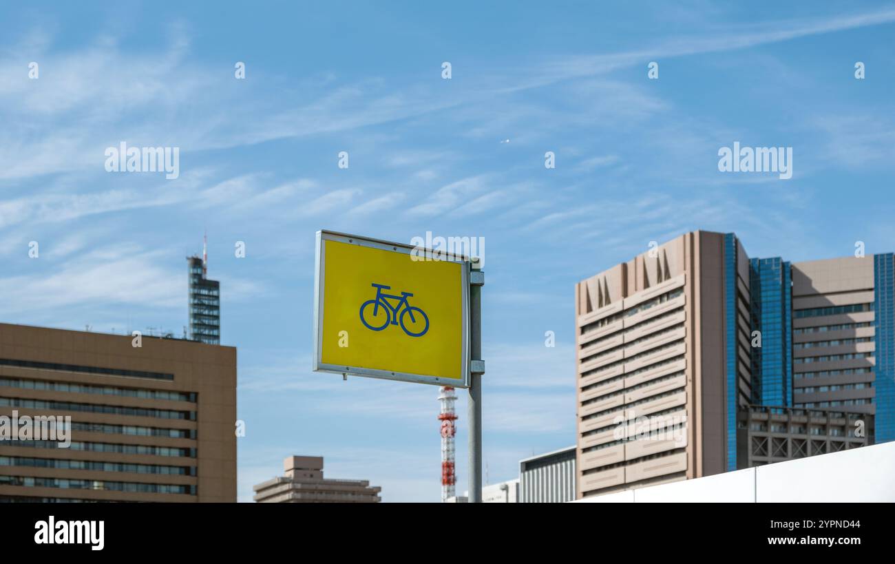 Yellow sign with a bicycle icon, designated path for bikes. Tall ...